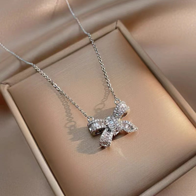 Wholesale Titanium Steel Bow Necklace JDC-NE-DiNai003 — JOYASDECHINA ...